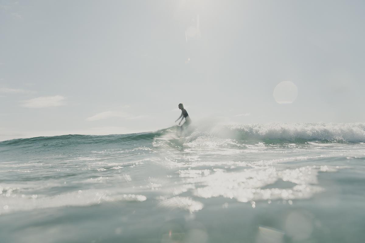 Surfing at Mangawhai Heads Beach | Riparide