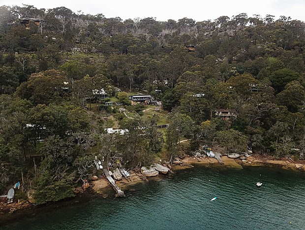 The Retreat at Coasters - A house on some rocks in the trees. With a ...