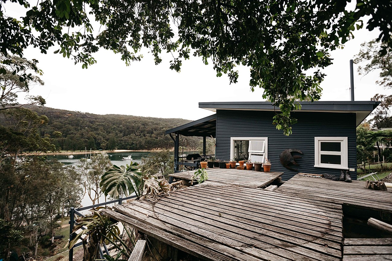 The Retreat at Coasters - A house on some rocks in the trees. With a ...