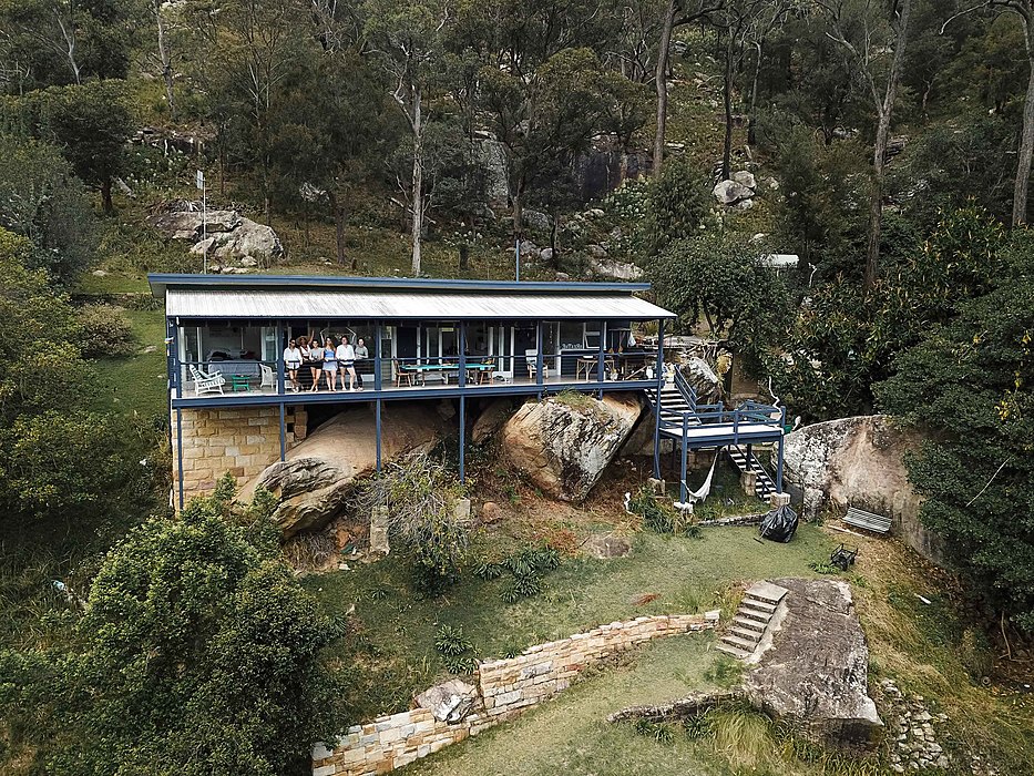 The Retreat at Coasters - A house on some rocks in the trees. With a ...